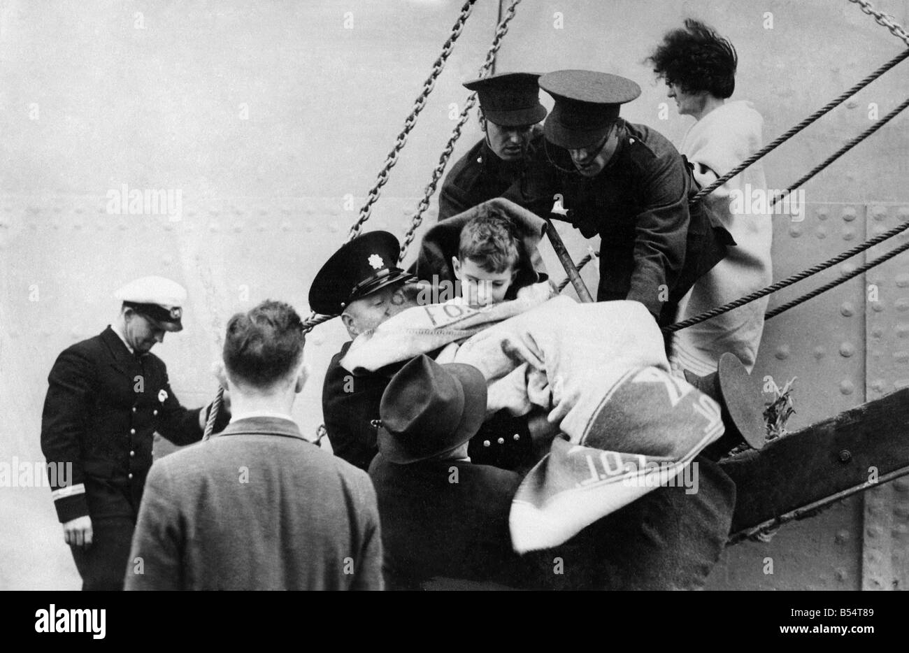 Survivors from the torpedoed liner SS Athenia are brought ashore after ...