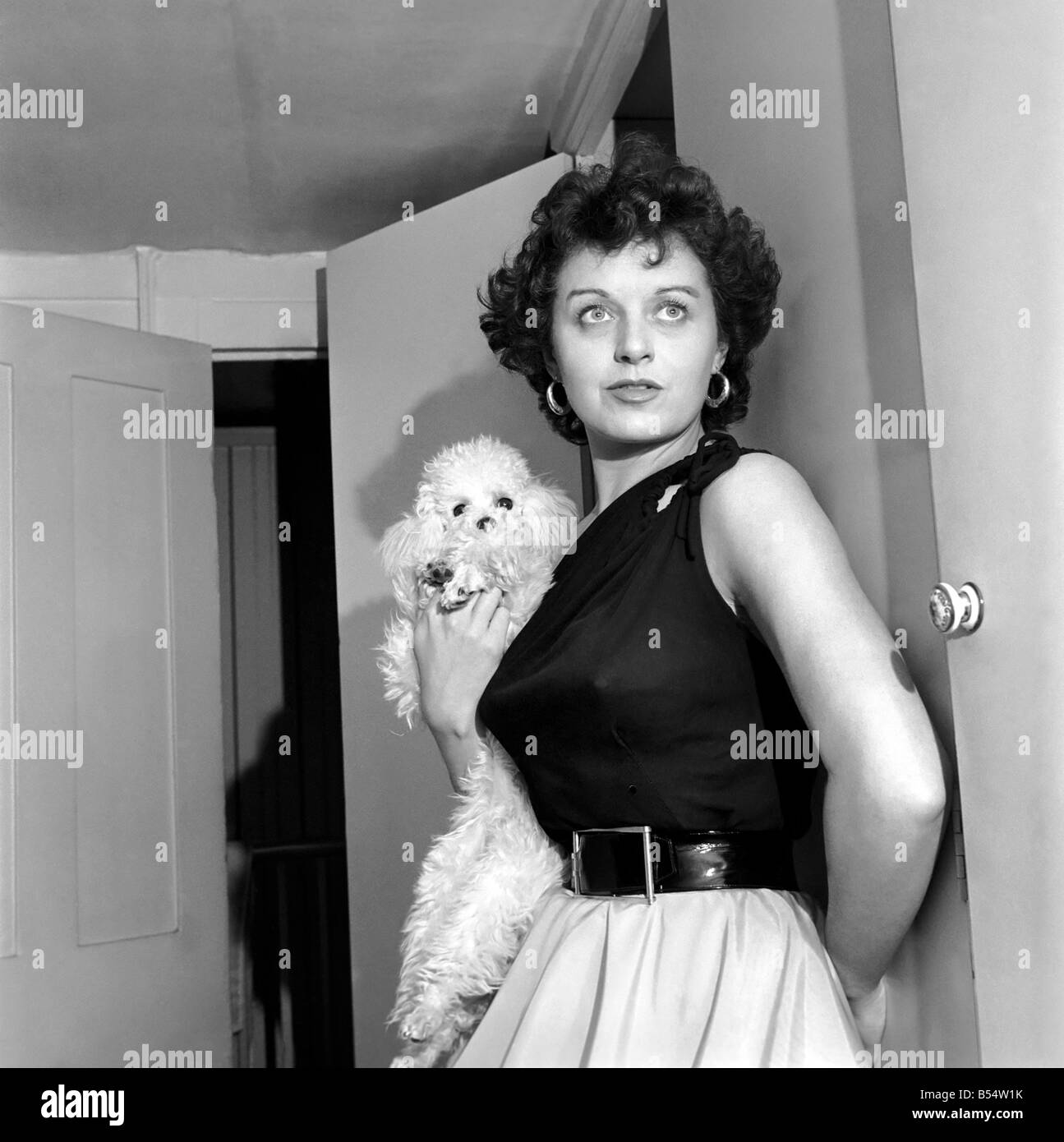 Actress Miss Elizabeth Webb with her poodle whose name is Skoshi ...