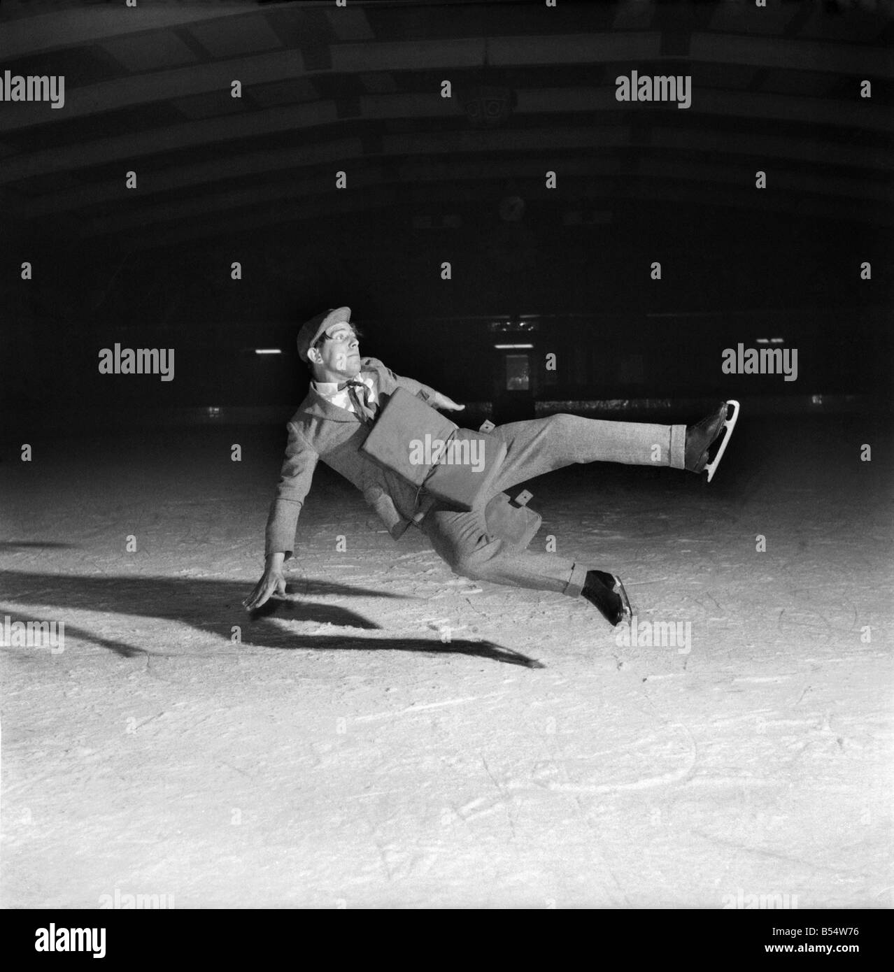 Comedian Norman Wisdom on ice. October 1953 D6365-003 Stock Photo - Alamy