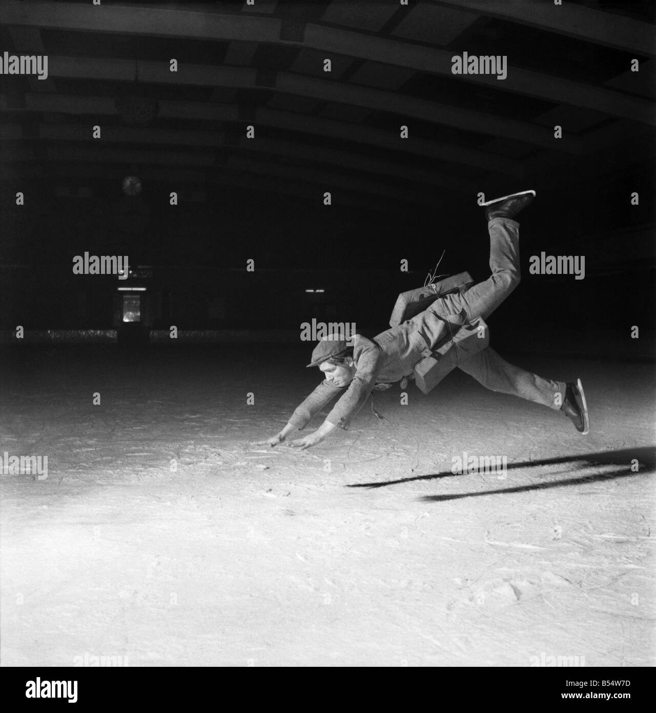 Comedian Norman Wisdom on ice. October 1953 D6365-007 Stock Photo - Alamy