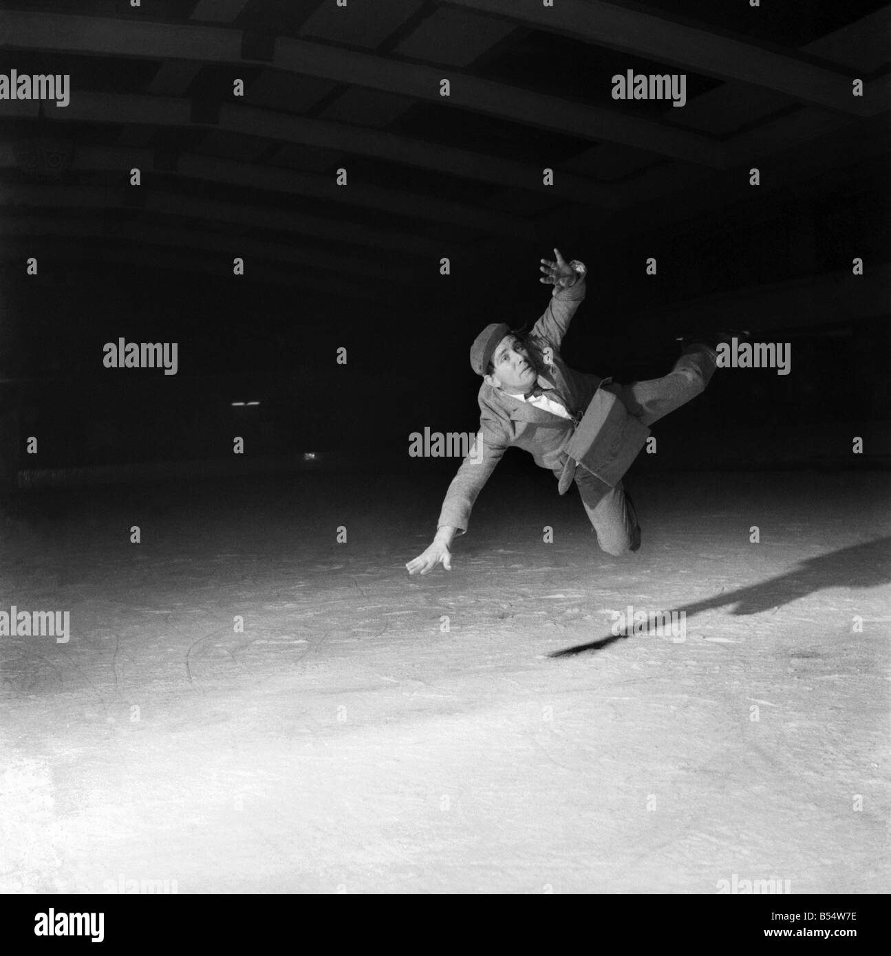 Comedian Norman Wisdom on ice. October 1953 D6365 Stock Photo - Alamy