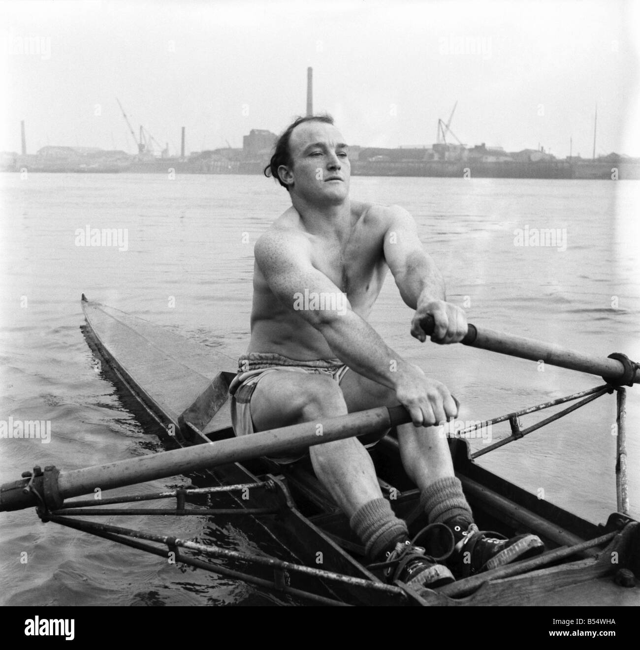 Ron Fagan, the 27 years old lighterman rowing on a London river. Ron is ...