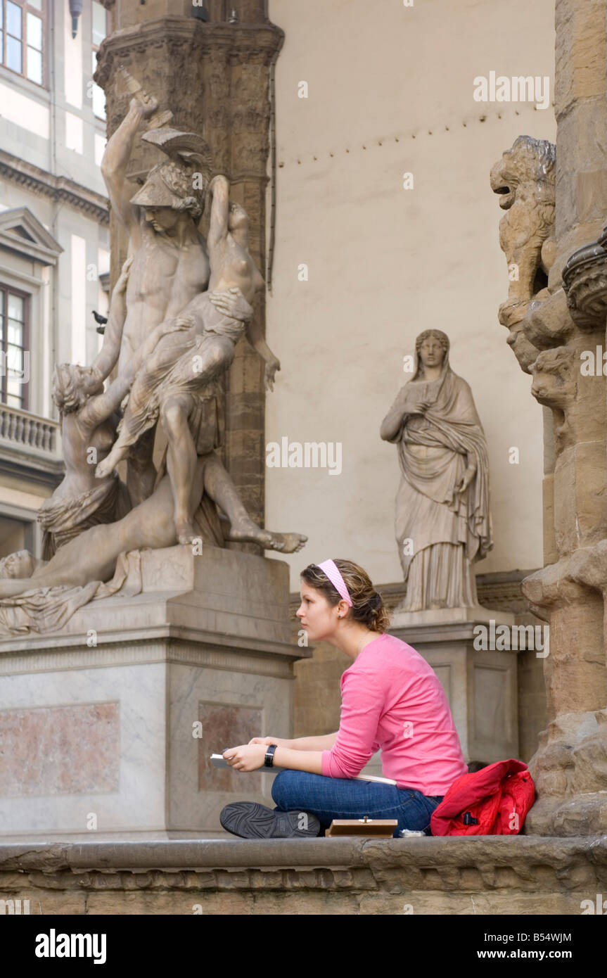 An artist painting from The Loggia dei Lanzi gallery of the Piazza ...