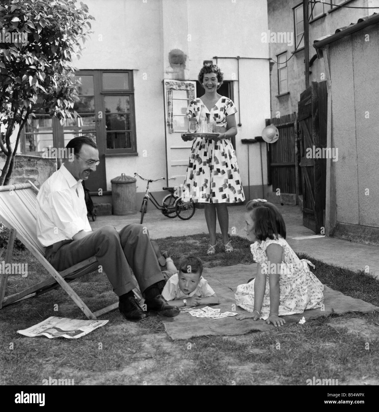 Family at home: Mr. and Mrs. Atkins, (Christian names Thelma and Derek ...