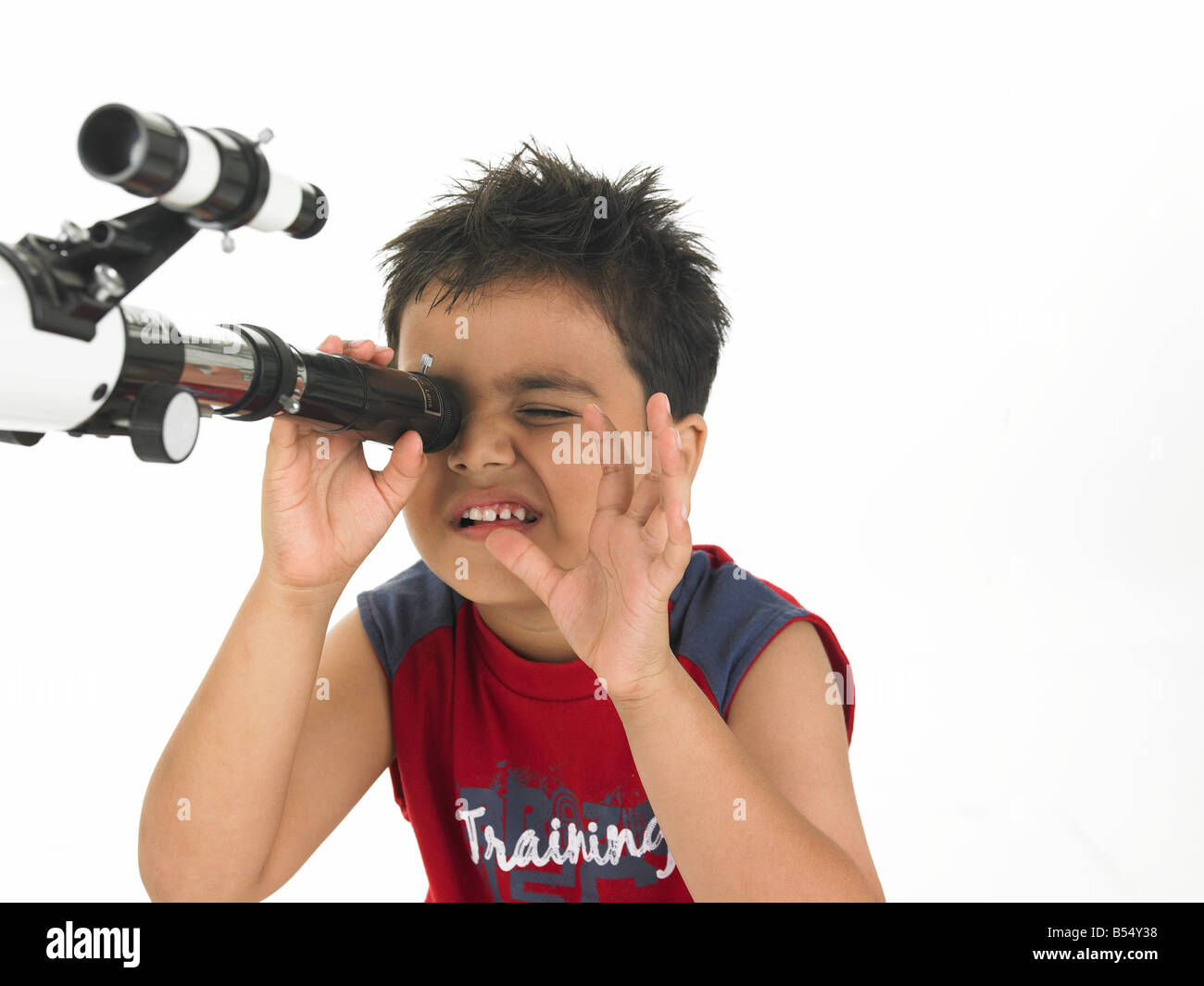 Asian boy of indian origin with his professional telescope Stock Photo ...