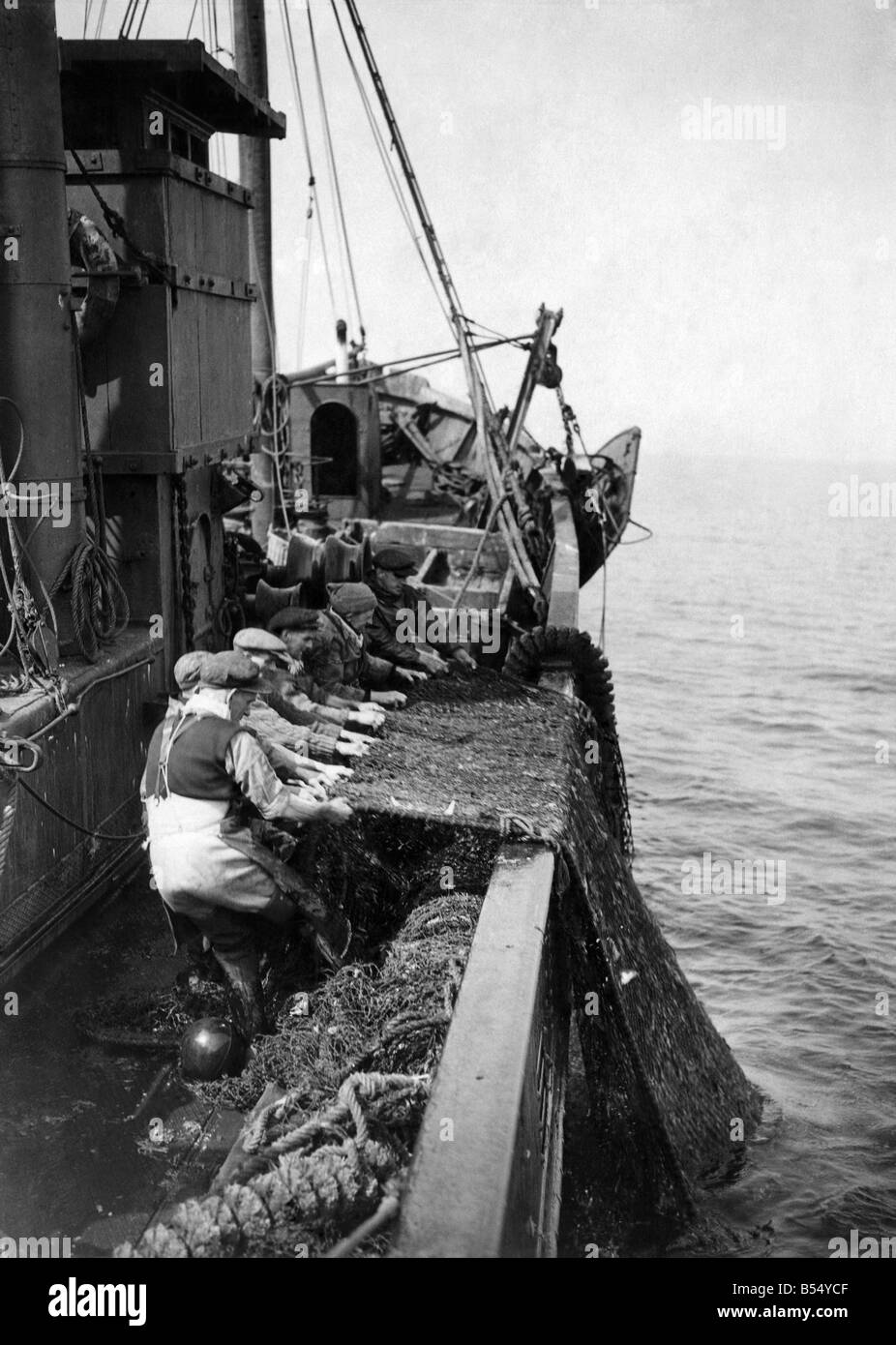 North East Coast Trawlermen heave up the nets after 5 hrs. fishing in ...