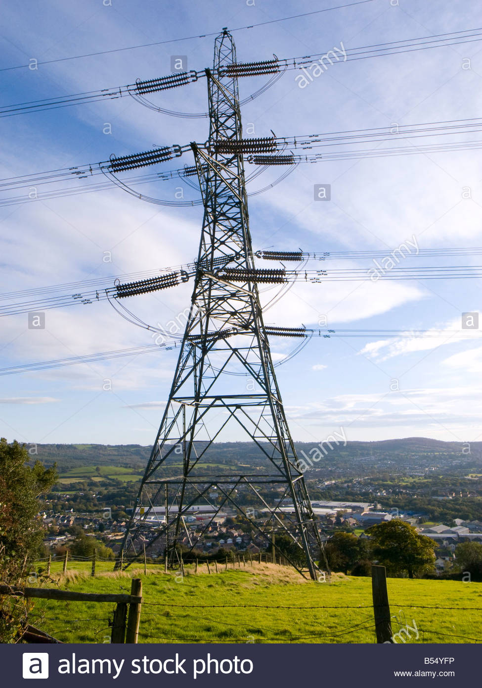 Electricity Pylons In A Field High Resolution Stock Photography and ...