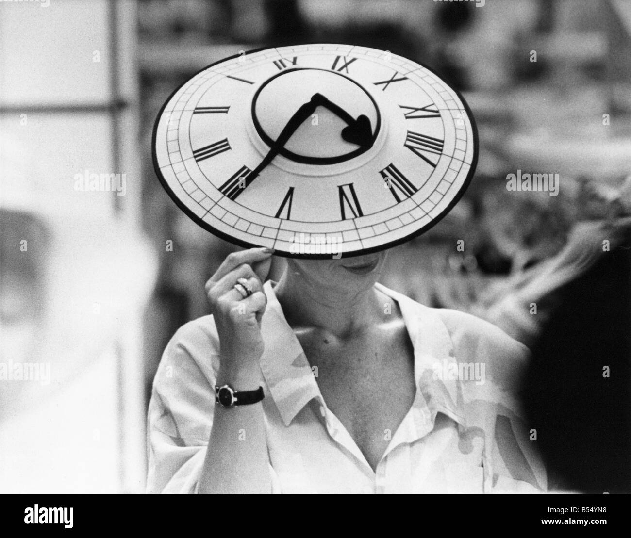 You ll never been late wearing this usual clock hat Stock Photo - Alamy