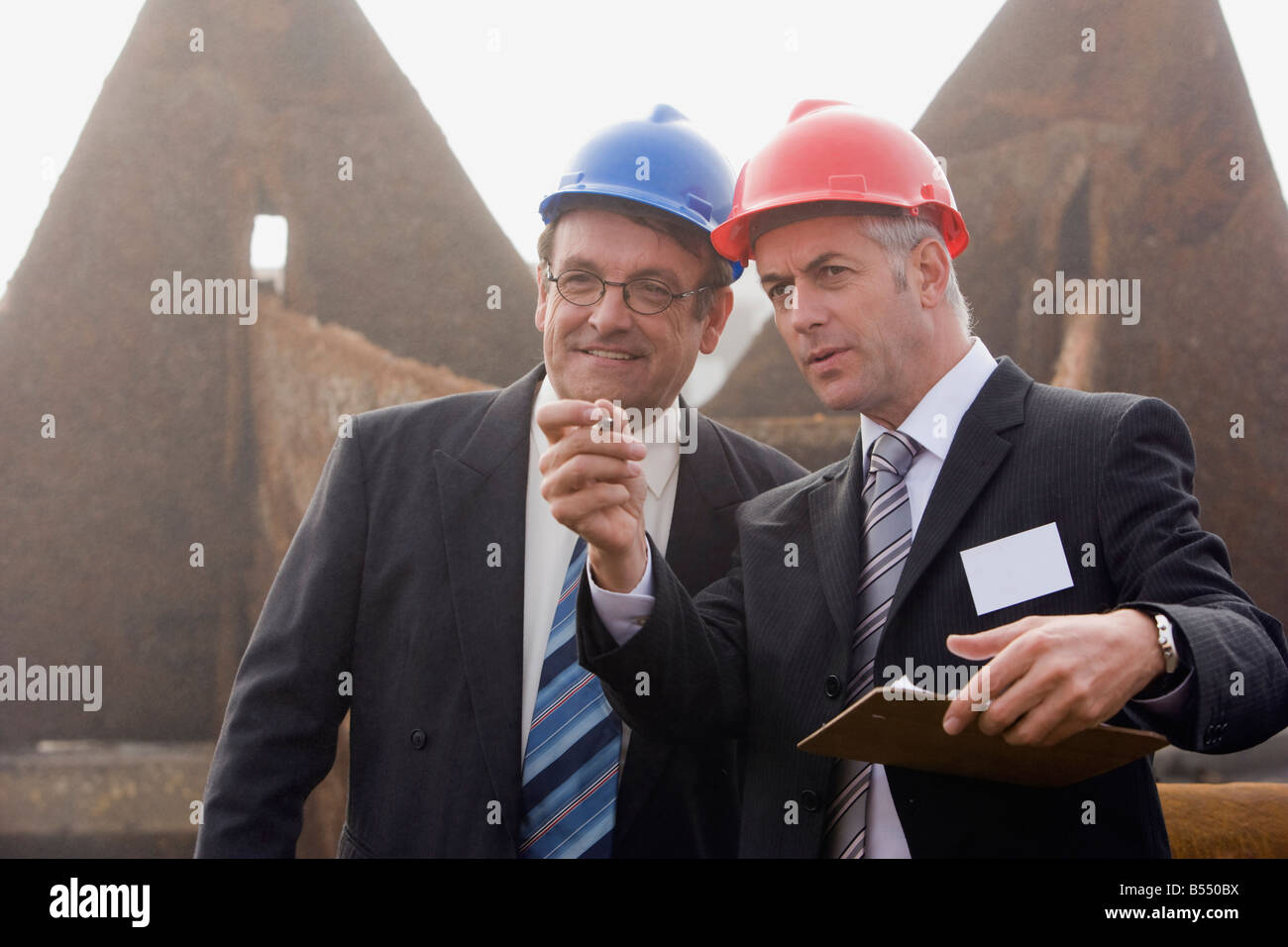 Two construction engineers standing together on survey Stock Photo - Alamy