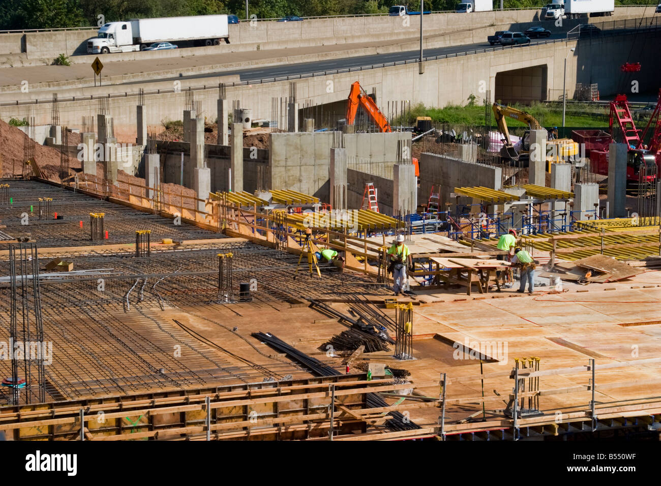 Workers at a construction site Stock Photo - Alamy