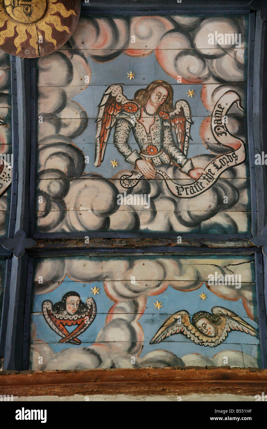 Jacobean painted ceiling showing clouds angels and the sun in St Peter ...