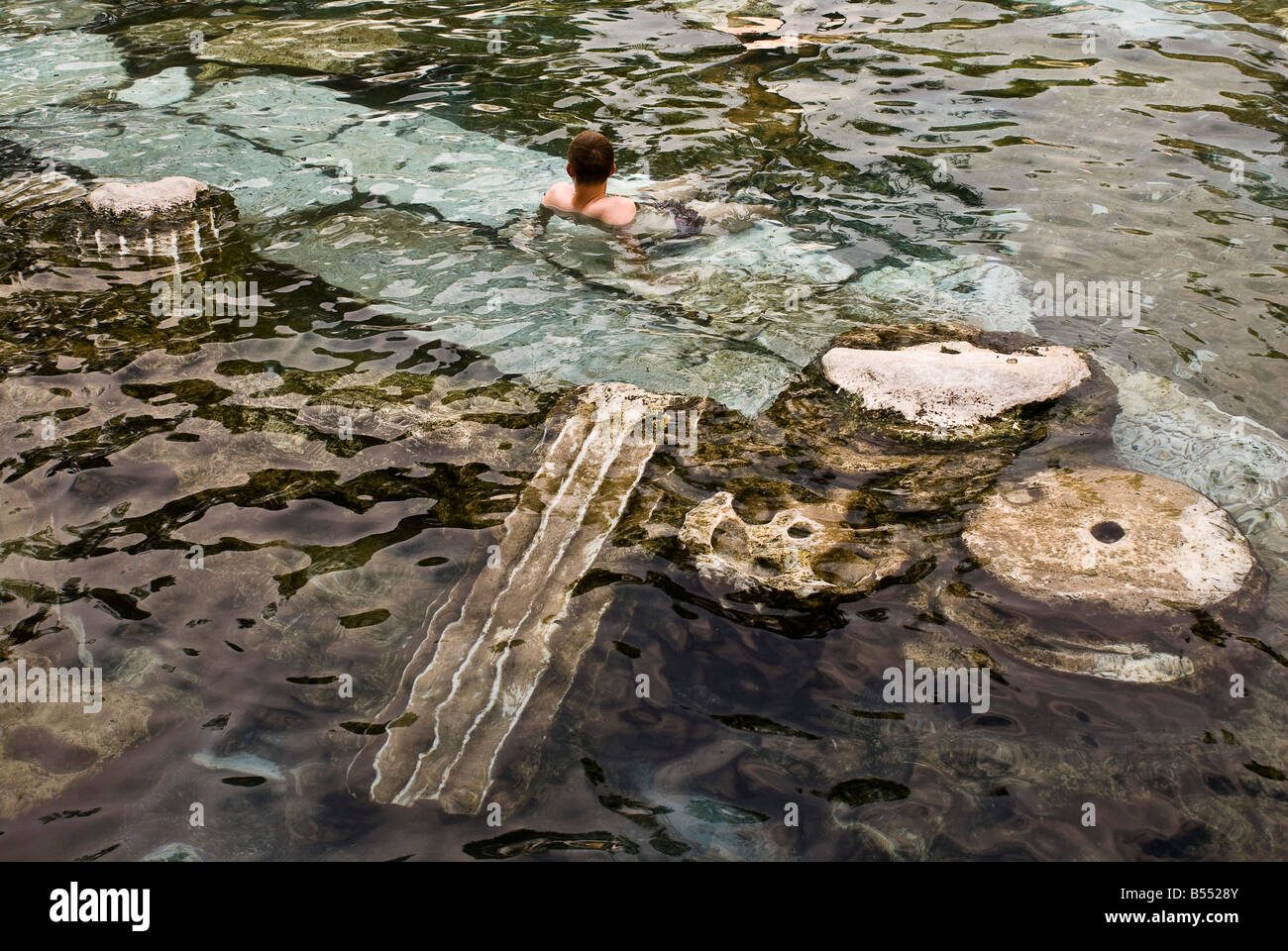 The old hot spring in Hierapolis, the ancient city on top of the famous ...