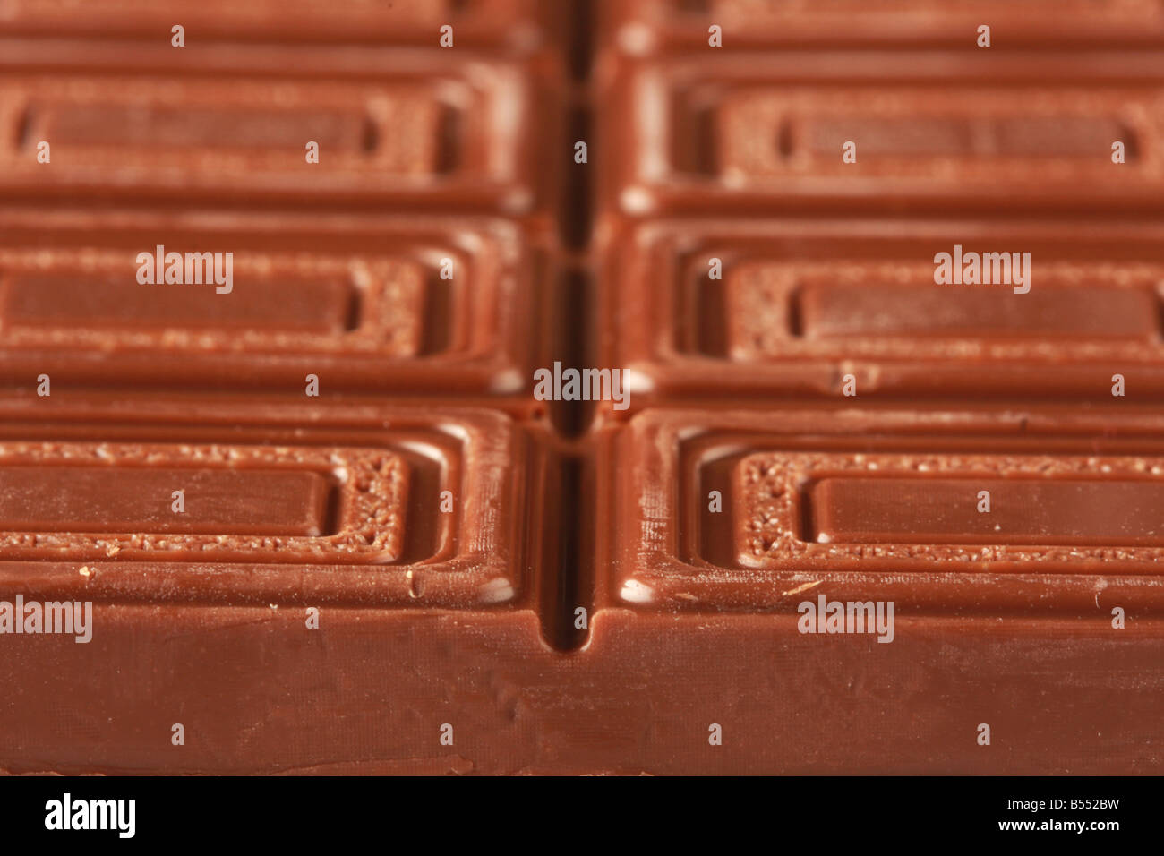 Milk chocolate isolated on white shot in studio Stock Photo - Alamy