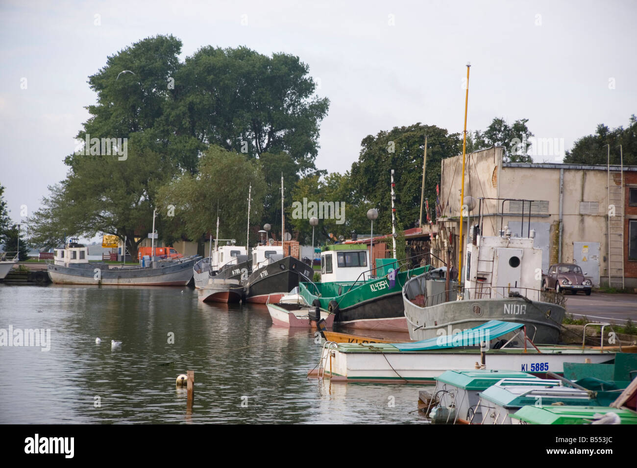 waterfront and fishing boats Nida on the Curonian spit Lithuania Stock ...