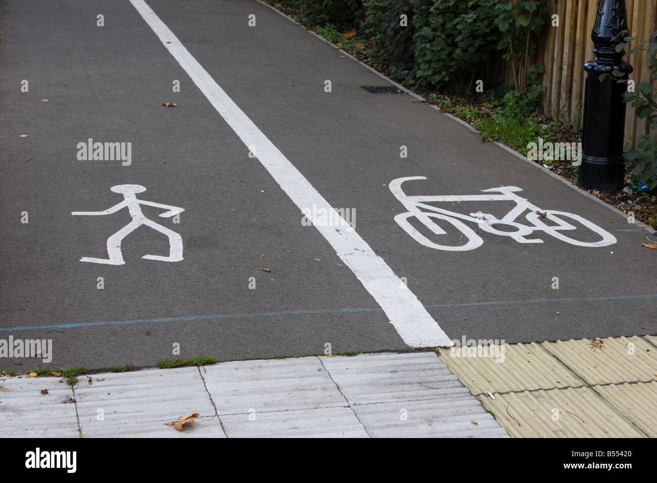 Road markings for pedestrian and cycle walkway Stock Photo - Alamy