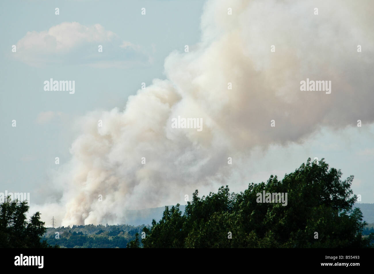Plumes of smoke trailing into the air Stock Photo - Alamy