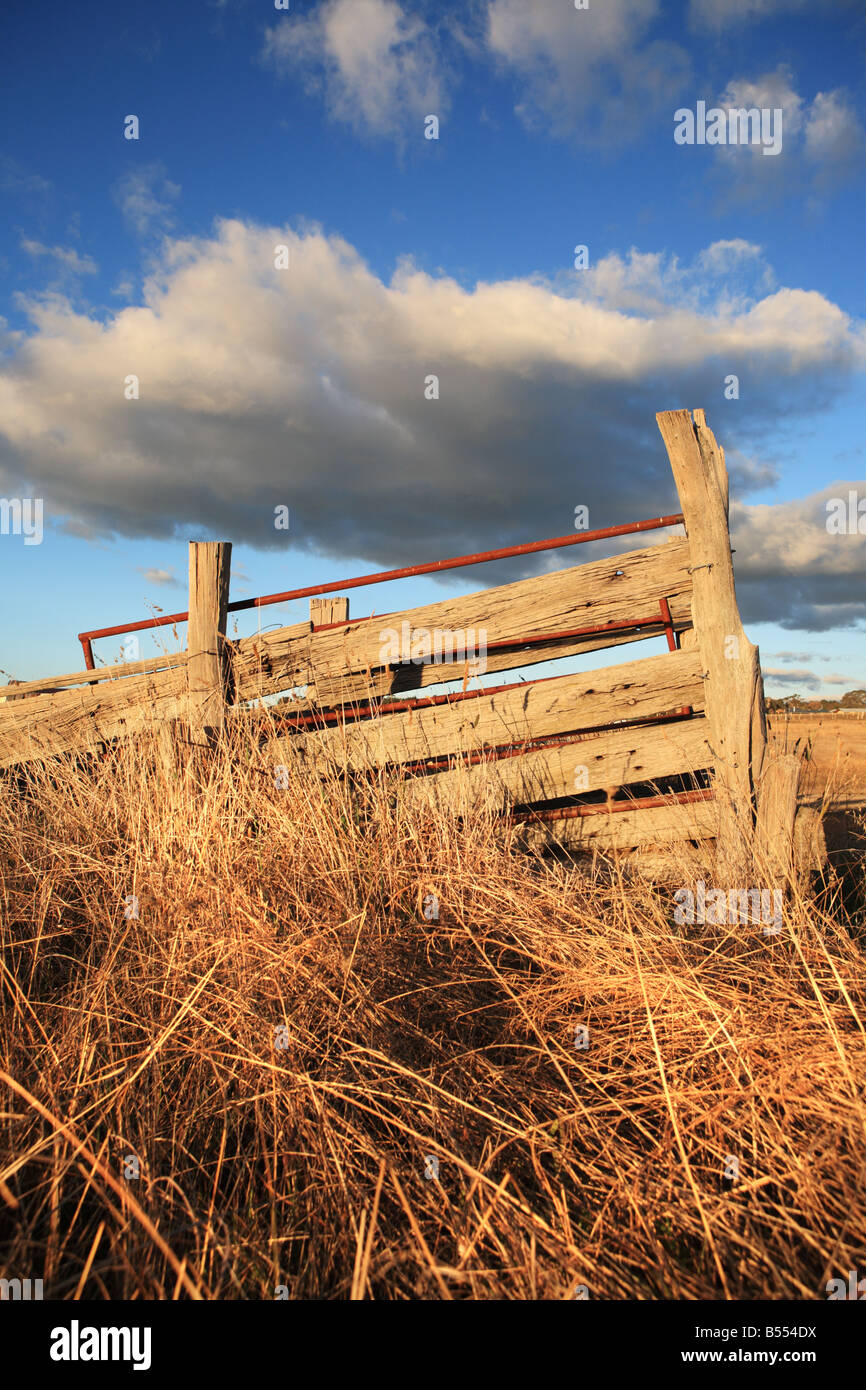 Old farm equipment at sunset Stock Photo - Alamy