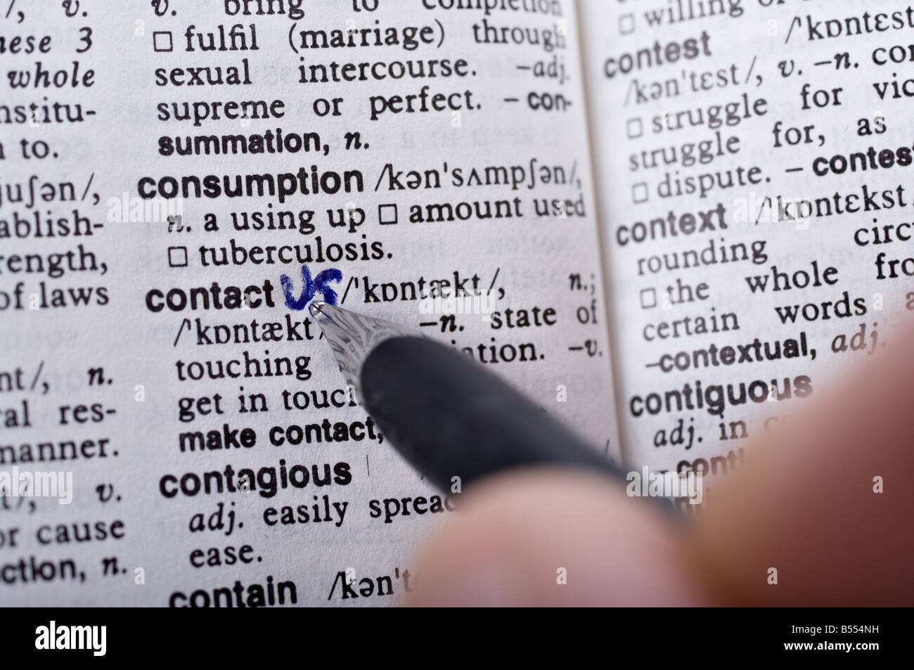 pen writing in us after the contact in dictionary Stock Photo - Alamy