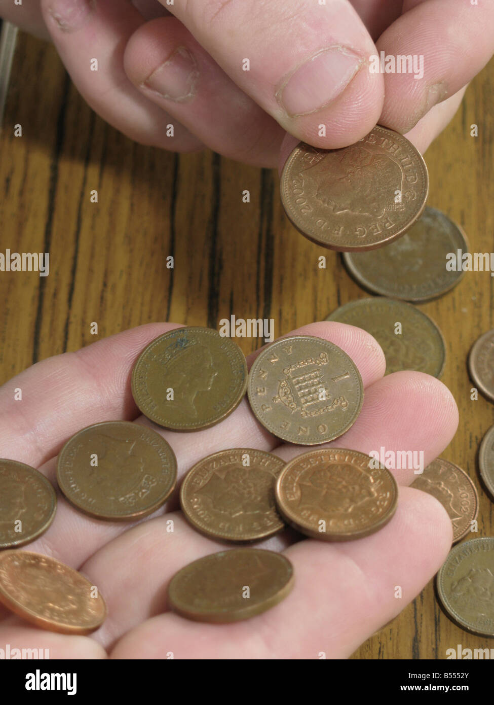 Male hands counting money one hi-res stock photography and images - Alamy