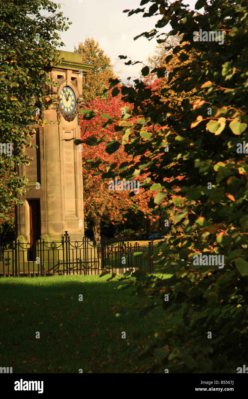 A stone clock tower in an autumnal setting Stock Photo - Alamy
