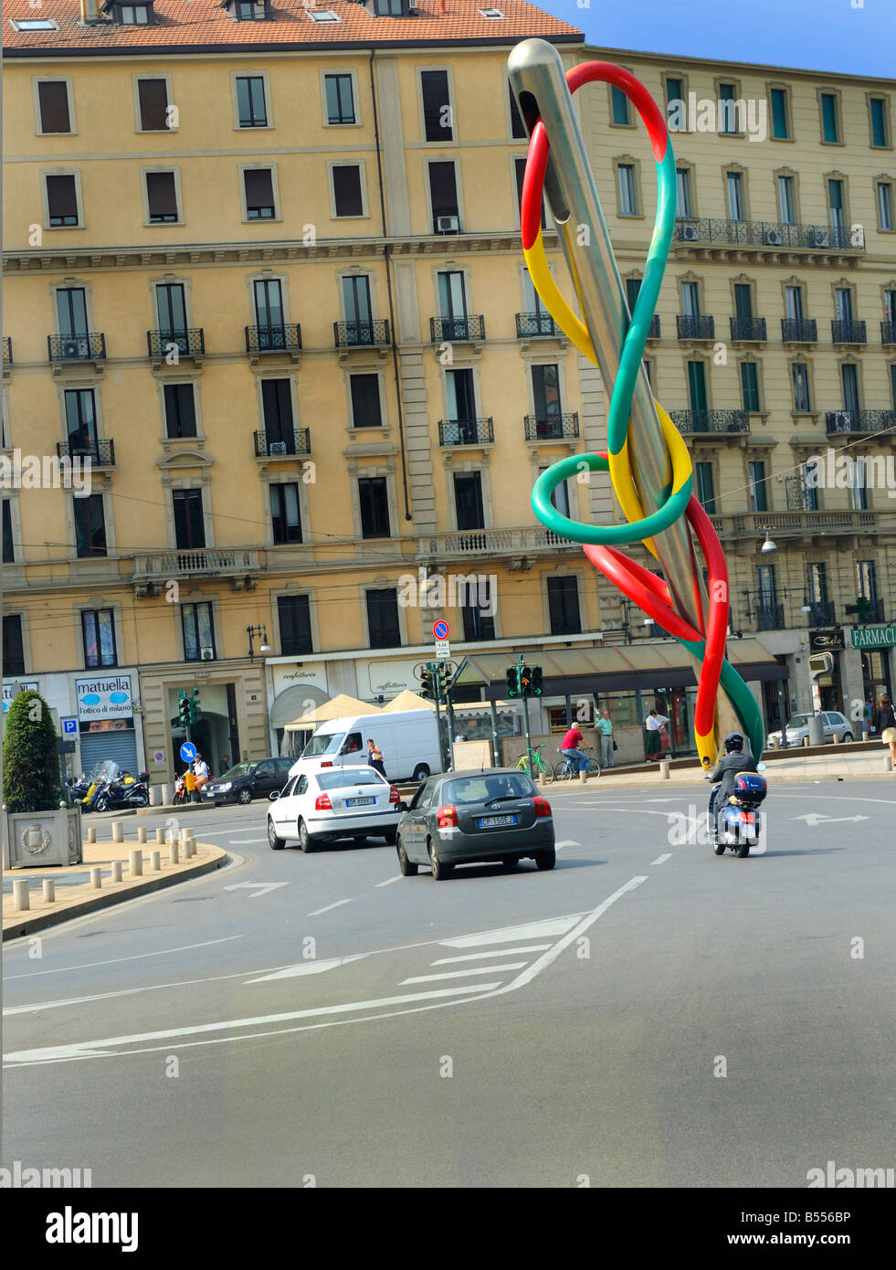 Street Sculpture of a needle and thread in Milan in Northern Italy ...