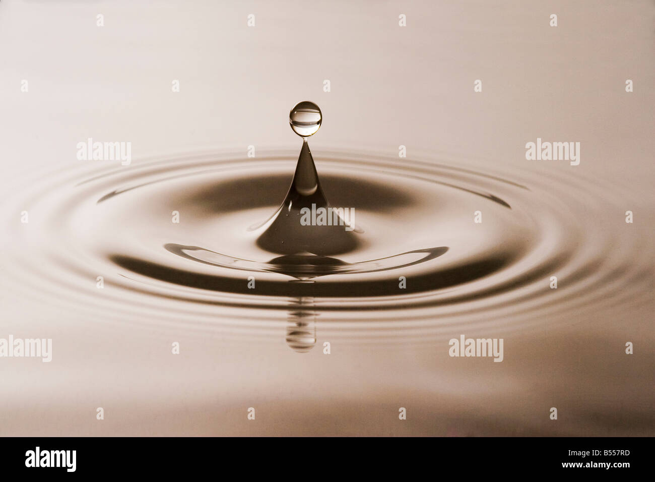 Water drop balancing on a water pyramid (splash Stock Photo - Alamy
