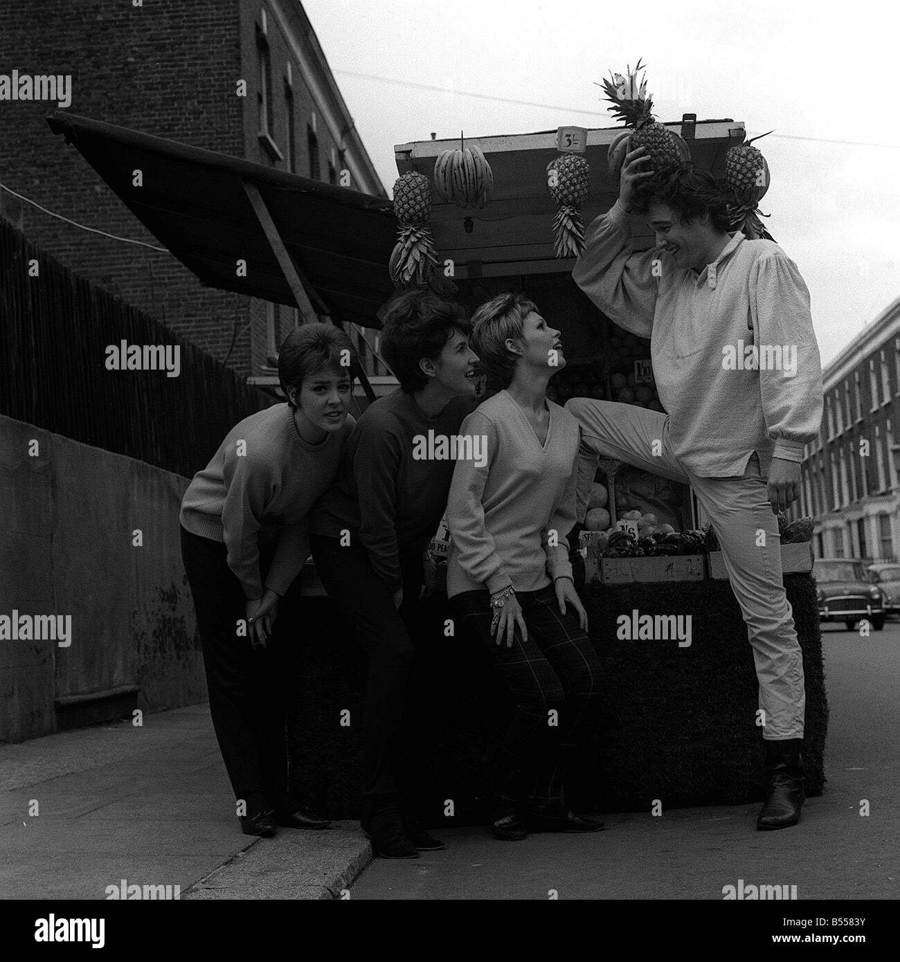 Singer P J Proby entertains the Vernon girls during a break in ...