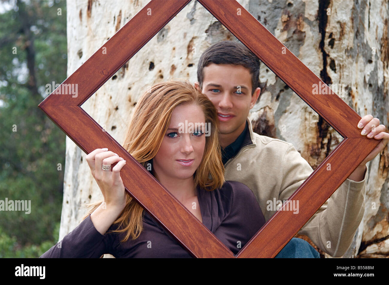 Romantic couple in picture frame hi-res stock photography and images ...