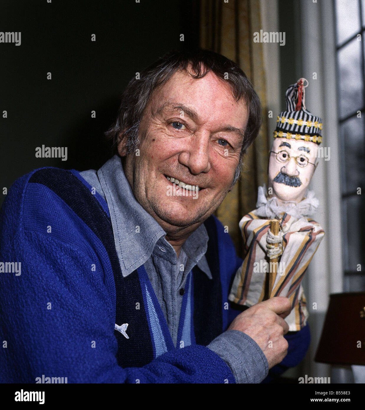 Johnny Speight 1981 holding Alf Garnett puppet Stock Photo - Alamy