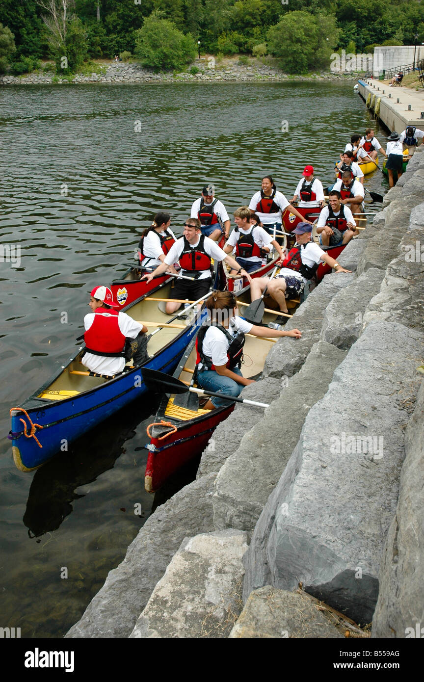 A group of people having fun canoeing together Stock Photo - Alamy