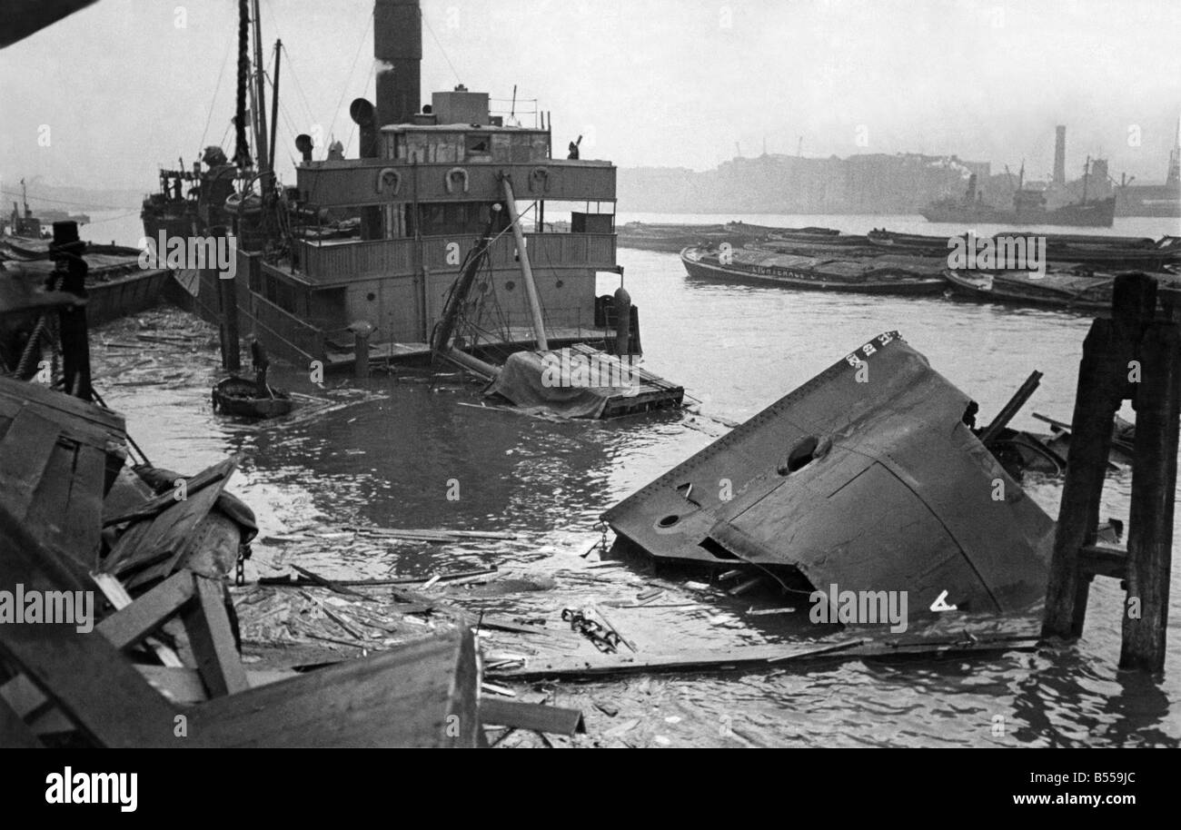 World War II: Shipping. This cargo steamer sank in the Thames yesterday ...