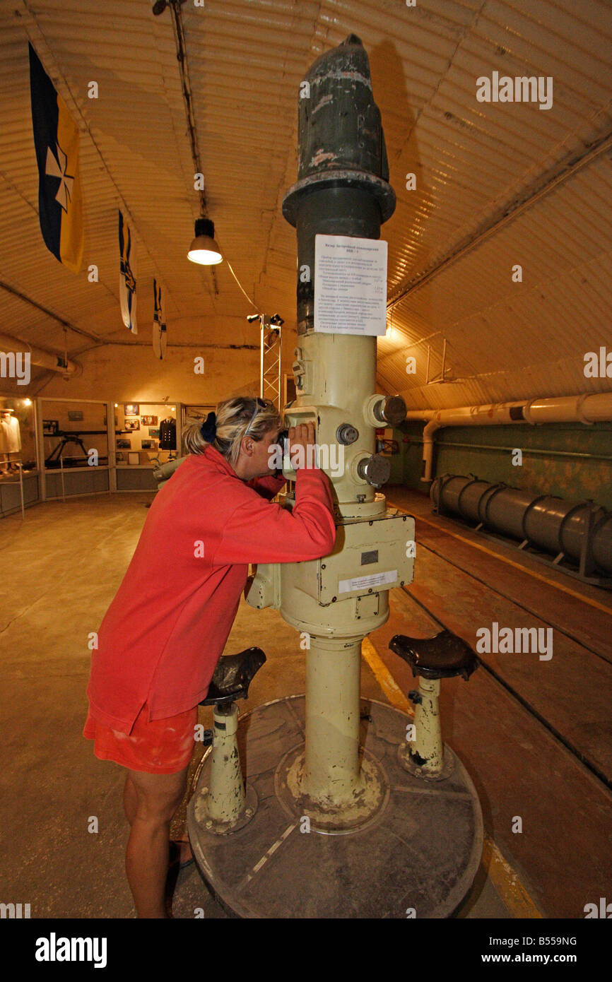 girl looking in periscope Stock Photo - Alamy
