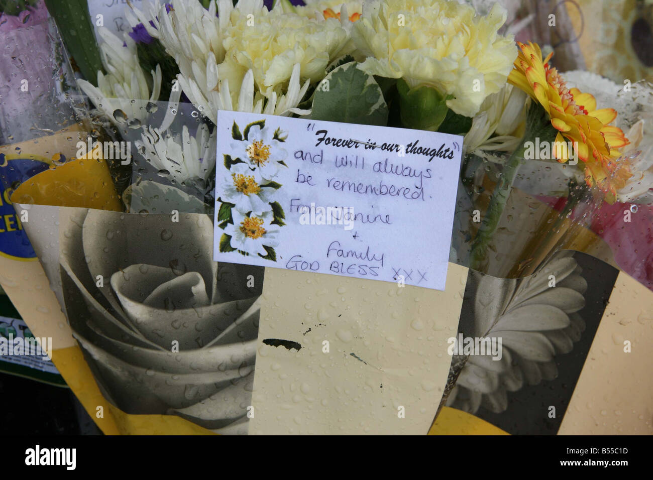 Floral tributes at the pool in Bilston which claimed the life of Shane ...
