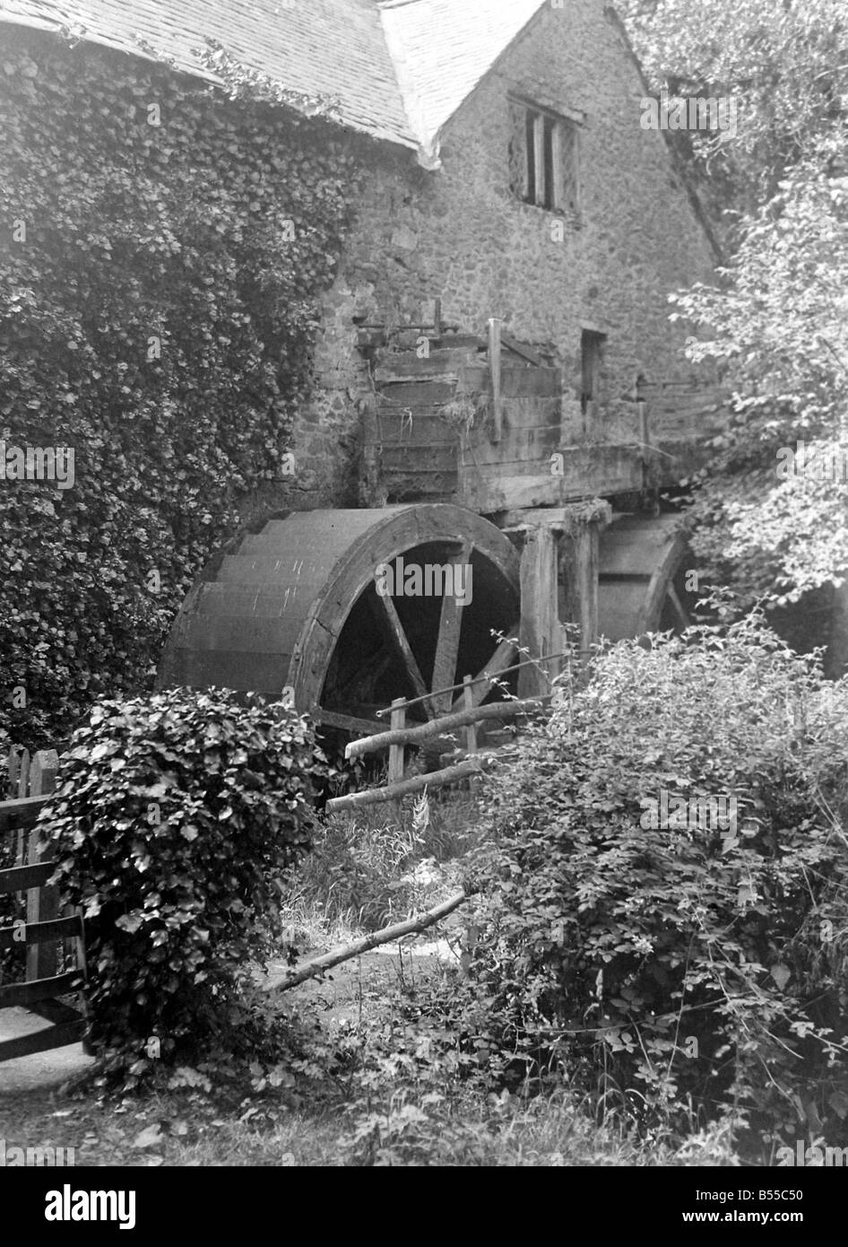 Old water mill at Dunster in Somerset August 1921 Alf 60 Stock Photo ...