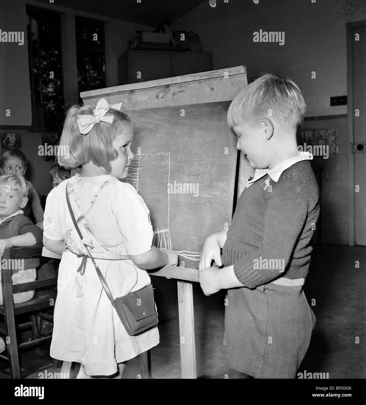 A boy and girl seen here painting at the Barley Park Day Nursery in ...