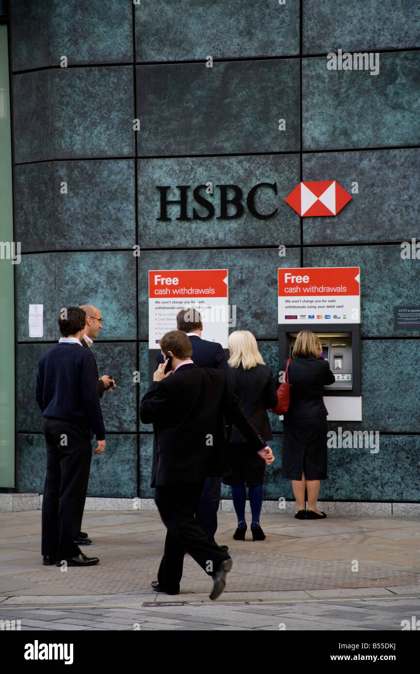 People queueing at HSBC cashpoint Stock Photo - Alamy