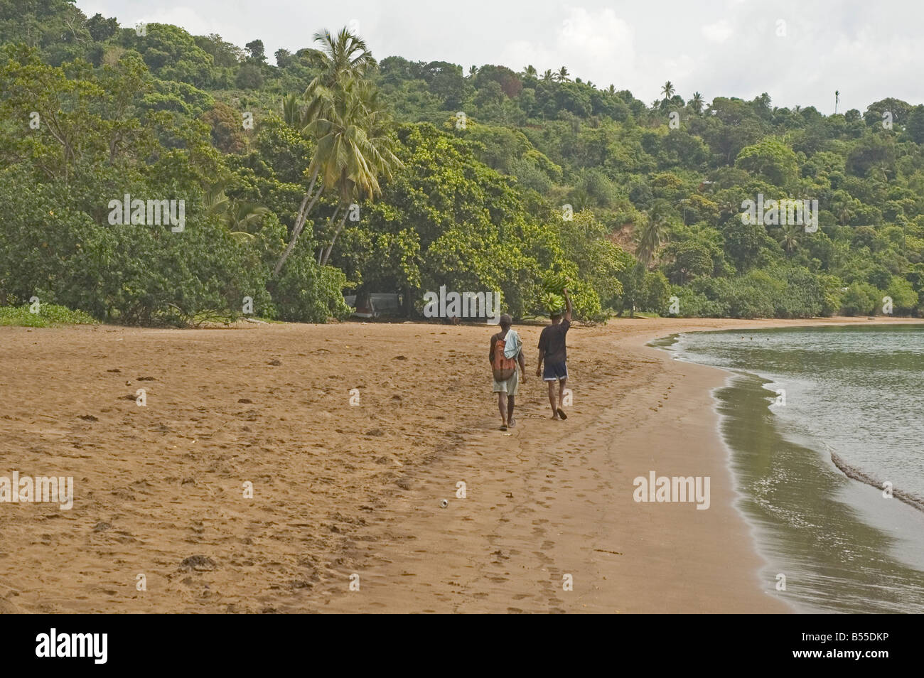 INDIAN OCEAN MAYOTTE Musical Beach with two locals Stock Photo - Alamy