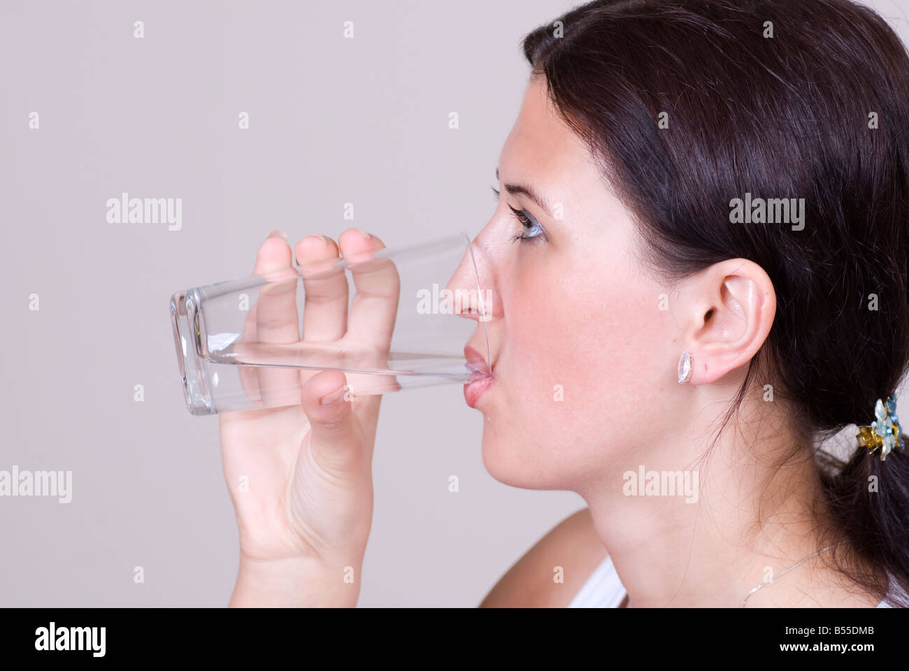 Woman drinking water Stock Photo - Alamy