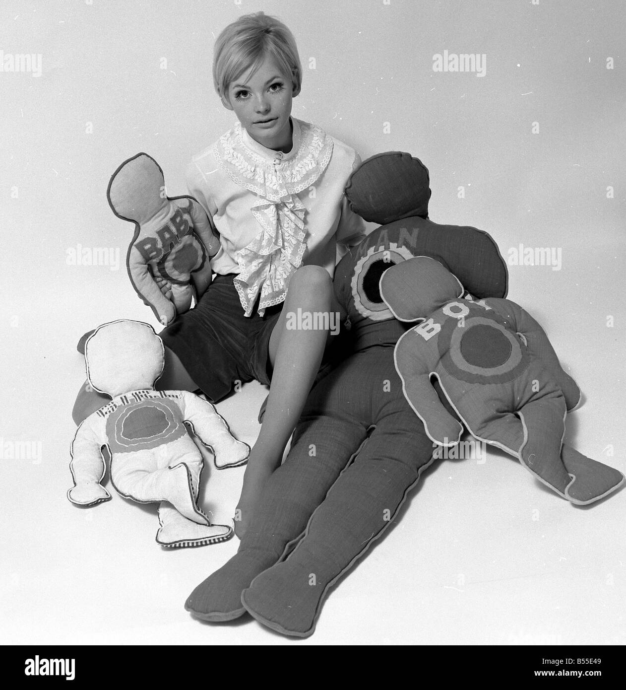 Woman Model with pillows in the shape of man and child January 1968 Y5 ...