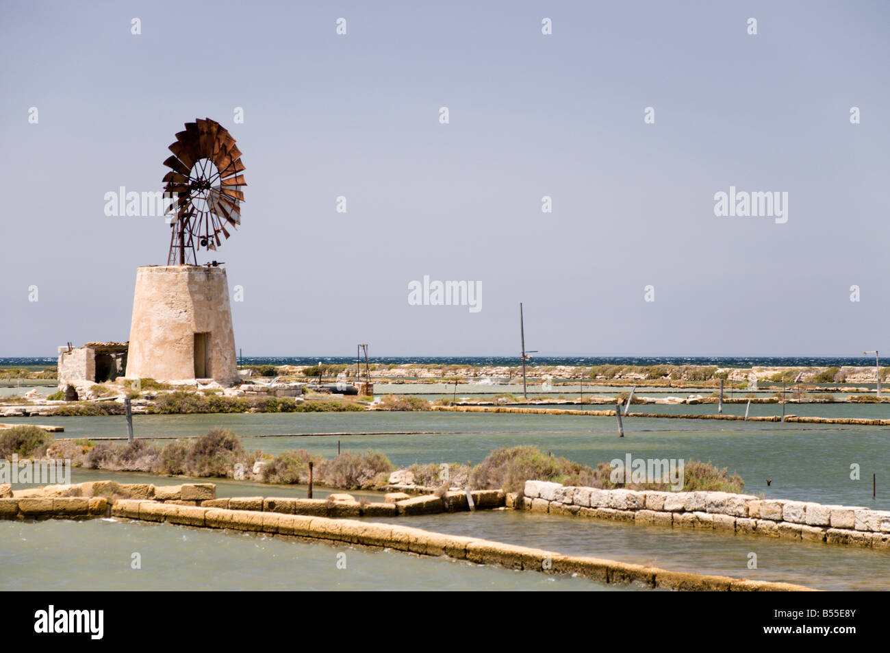 Windmills and salt marshes at Infersa Salt Pans Marsala Sicily Italy ...