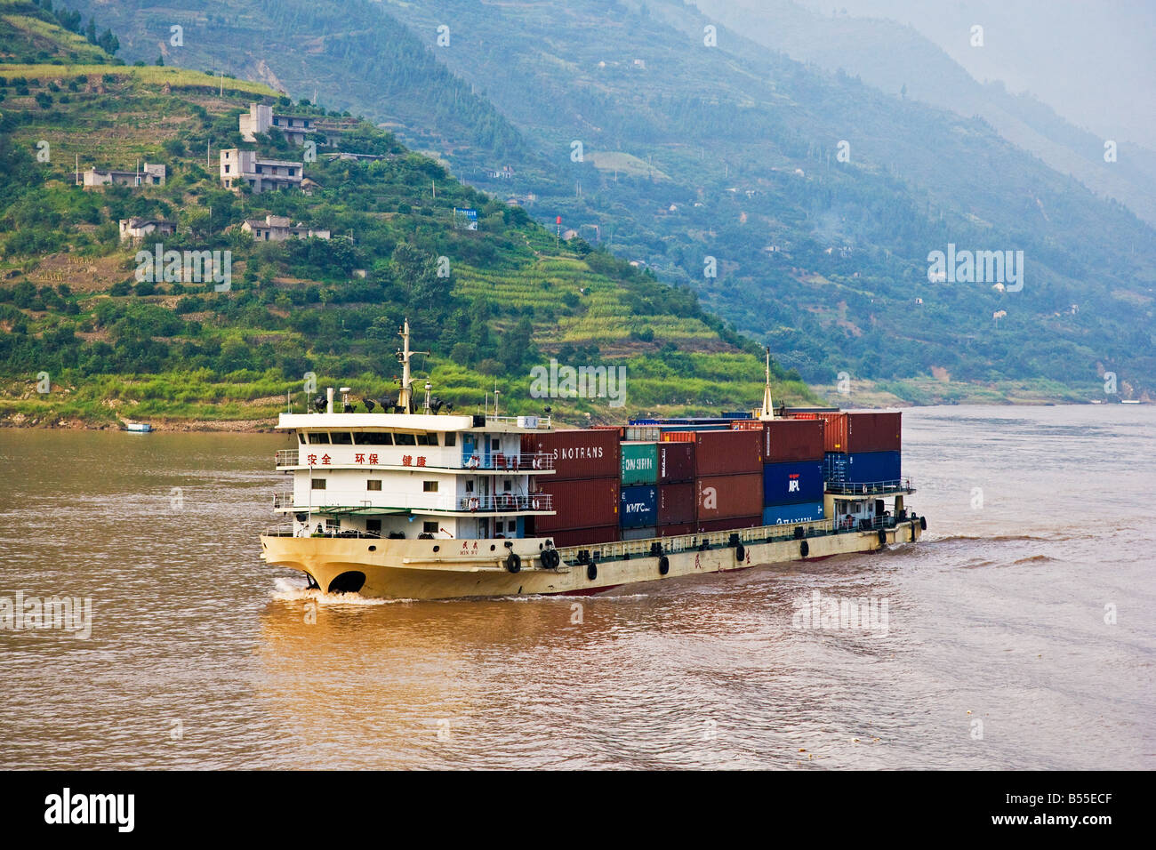 River boat Min Wu fully laden with containers on the Yangzi River China ...