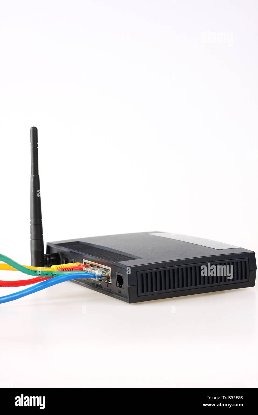 Adsl router with colored network cables connected to it Stock Photo - Alamy
