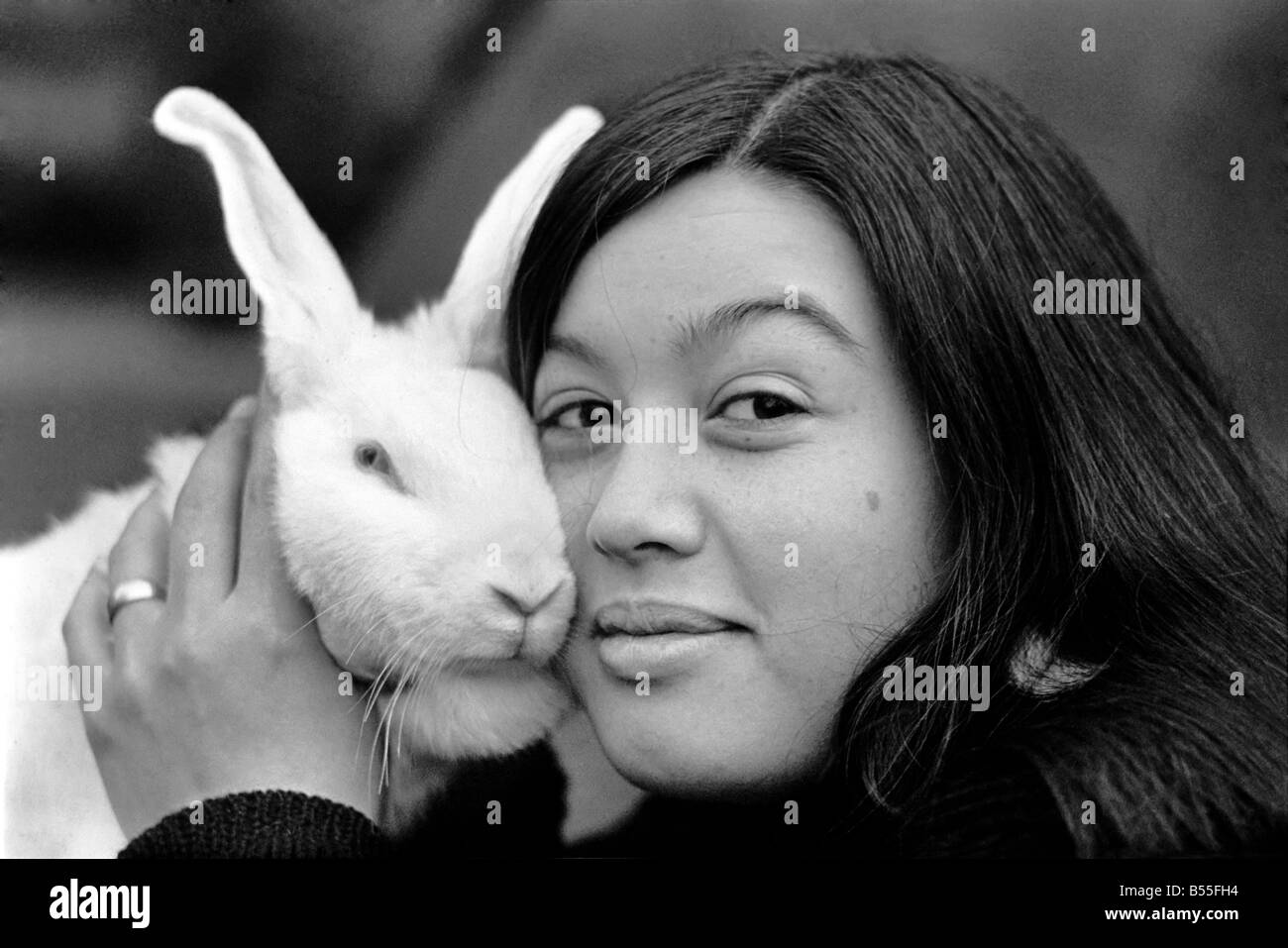 Woman holding rabbit close face hi-res stock photography and images - Alamy