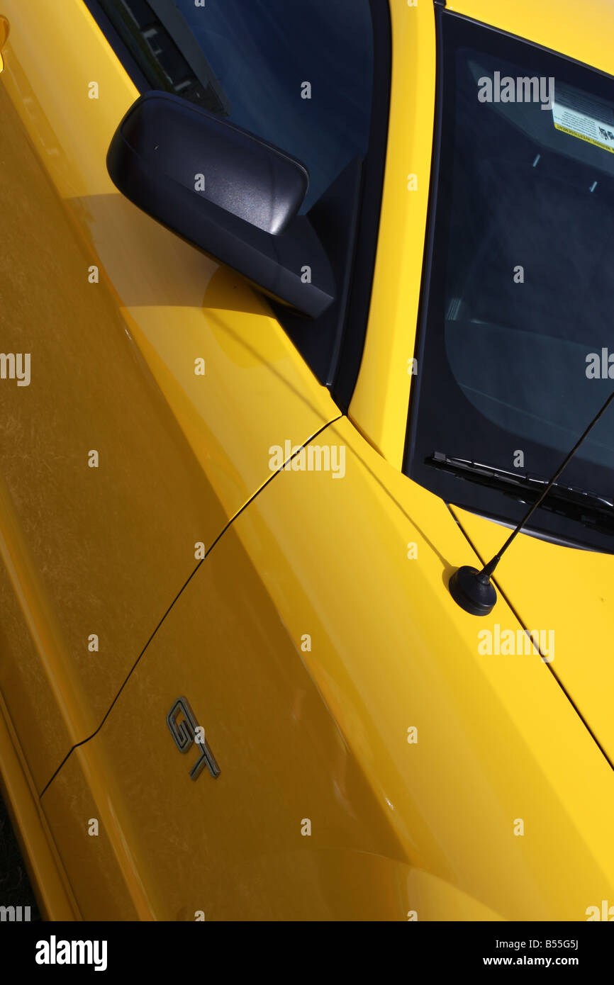 passenger door on a yellow gt sports car Stock Photo - Alamy