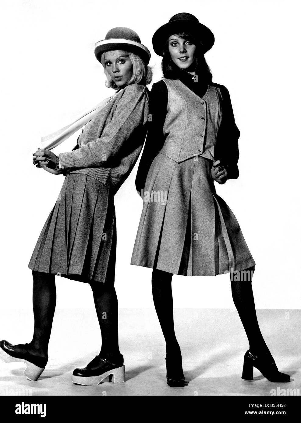 Clothing: Two little girls in grey all set for autumn. Jenny, on the ...