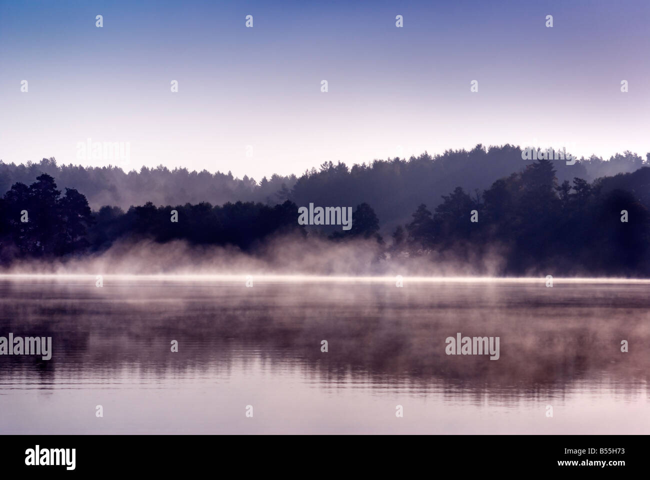 Mist over lake at dawn. Mazury, Poland. aRGB Stock Photo - Alamy