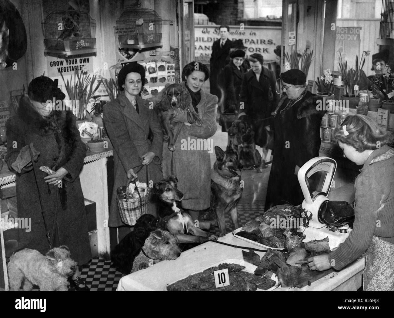 Queue ration Black and White Stock Photos & Images - Alamy