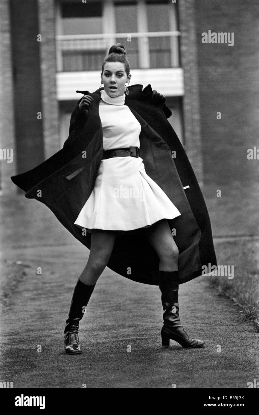 A model wearing the latest in fashions. Apr. Royle wearing a midi (it ...