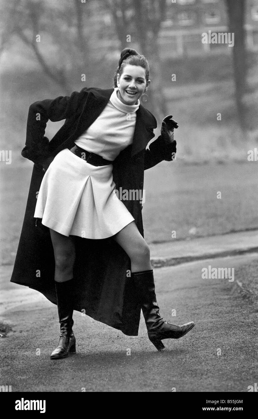 A model wearing the latest in fashions. Apr. Royle wearing a midi (it ...