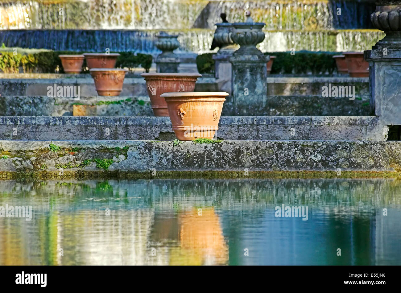 Reflection ponds at Villa D'Este, Tivoli, Italy with terracotta pots ...